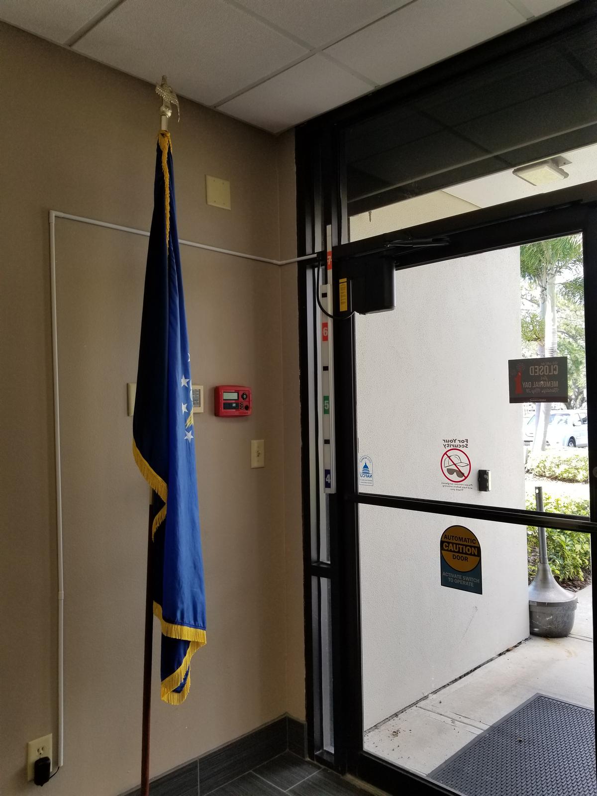 Norton ADA Ez door operator installed with battery - Florida Lock Doctor