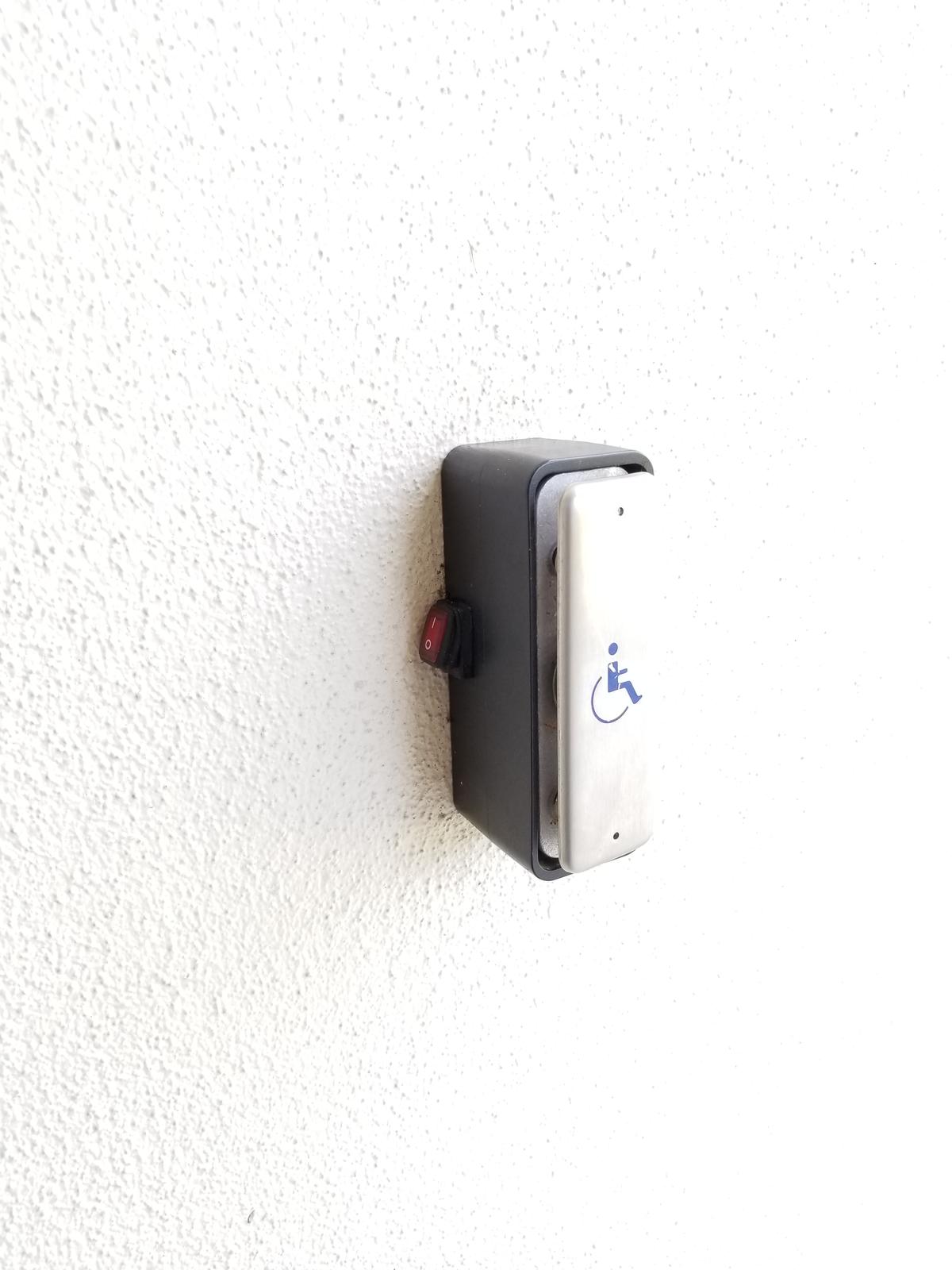 Norton ADA Ez door operator installed with battery - Florida Lock Doctor